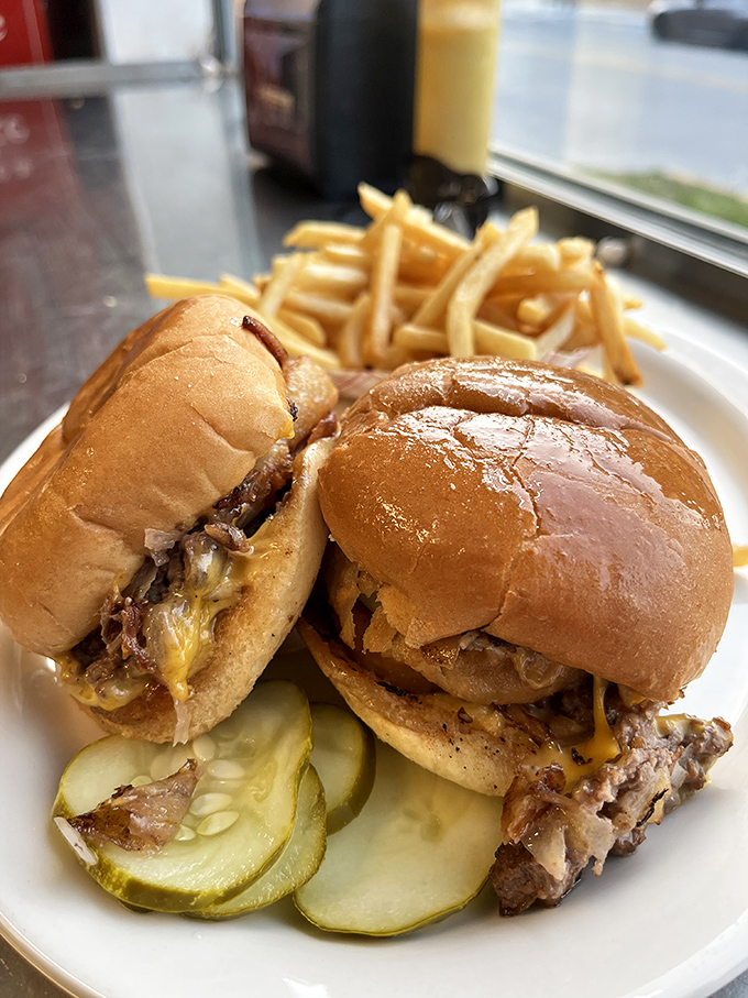 Behold the stars of the show&mdash;sliders with perfectly caramelized onions melting into the patty, a burger experience that defies their humble size.