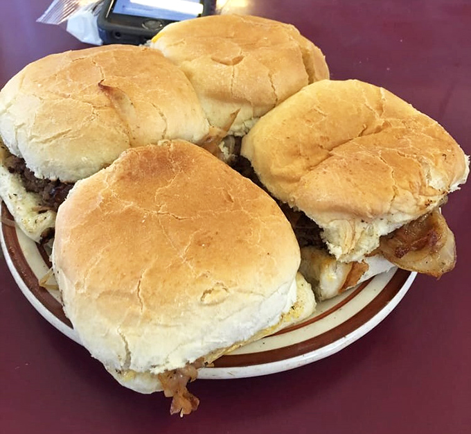 Four perfect sliders on a plate&mdash;like a barbershop quartet of beef, each one harmonizing with grilled onions and pillowy buns.