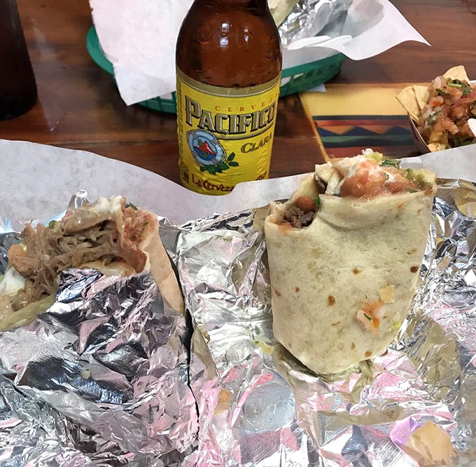 Foil-wrapped treasures paired with a cold Pacifico. Some people frame their first dollar; I'd frame this first bite.