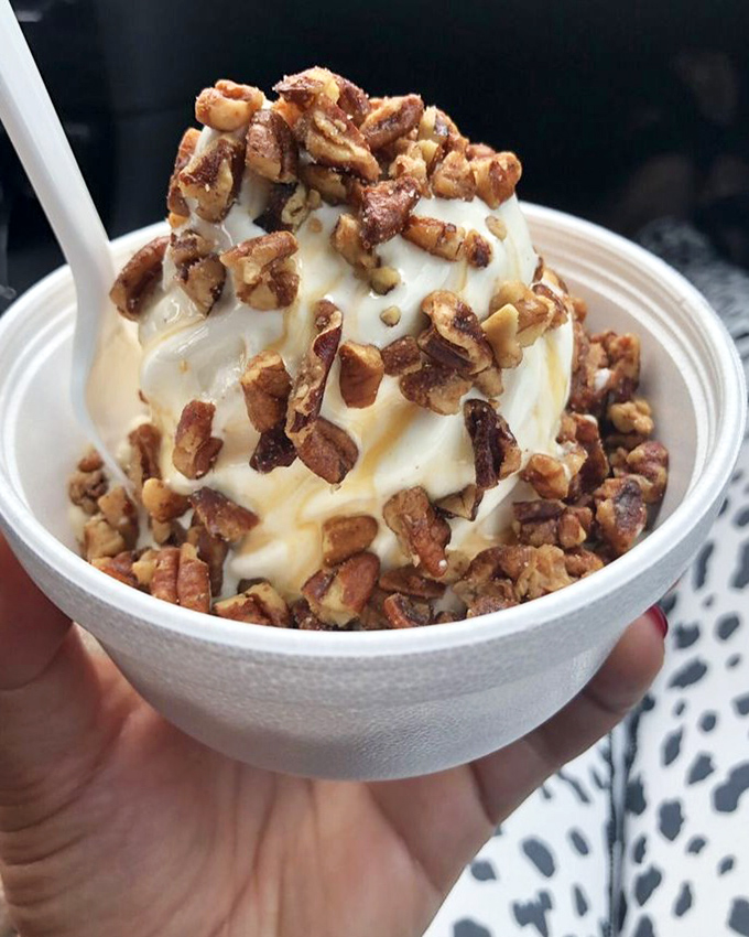 The butter pecan sundae arrives like edible architecture&mdash;vanilla soft serve draped in caramel and crowned with a generous landslide of candied pecans. Diet plans surrender immediately.