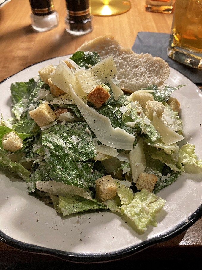 Not just any Caesar salad&mdash;this one's a textural symphony of crisp romaine, shaved parmesan, and house-made croutons that might make Julius himself weep with joy.