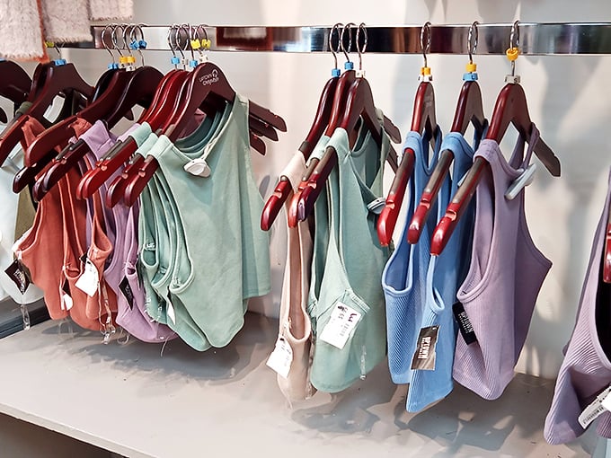 A rainbow of camisoles that proves secondhand doesn't mean second-best. Each hanger holds potential for both your wardrobe and wallet.