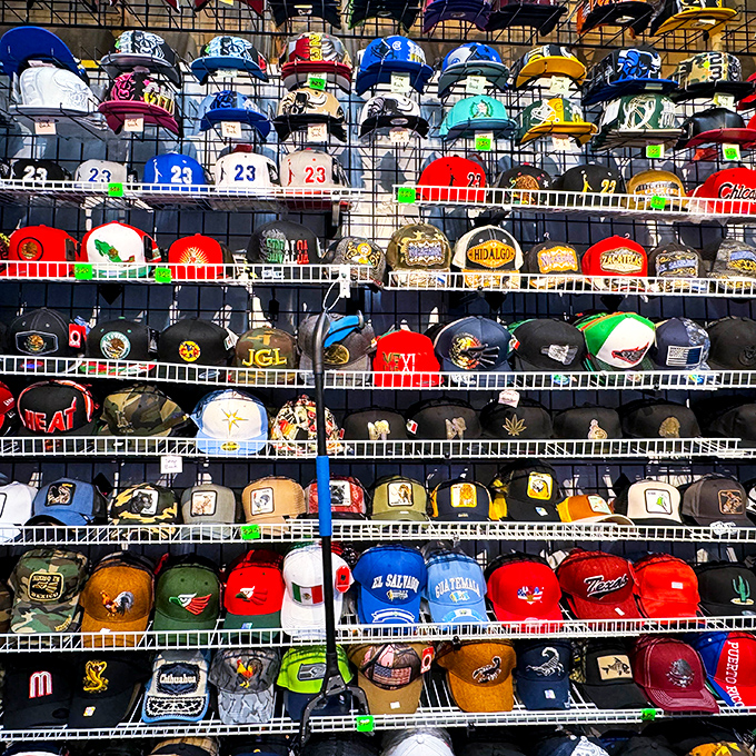 Baseball caps create a rainbow wall of team pride and personal style statements galore.