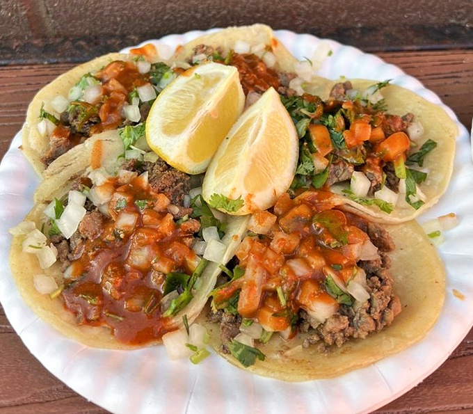 These carne asada tacos aren't just food; they're edible love letters topped with fresh cilantro, onion, and that essential squeeze of lime.