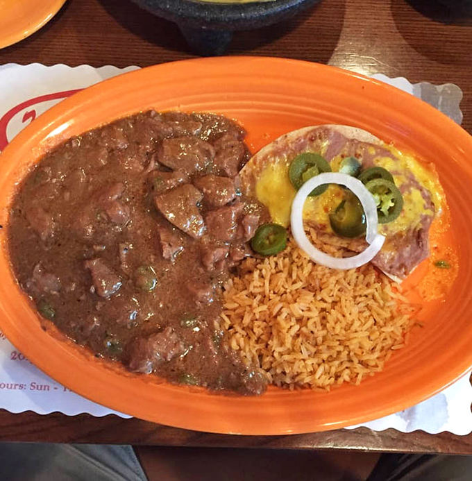 Carne guisada that makes time stand still. Those tender beef chunks swimming in rich gravy are the kind of comfort that transcends language barriers.