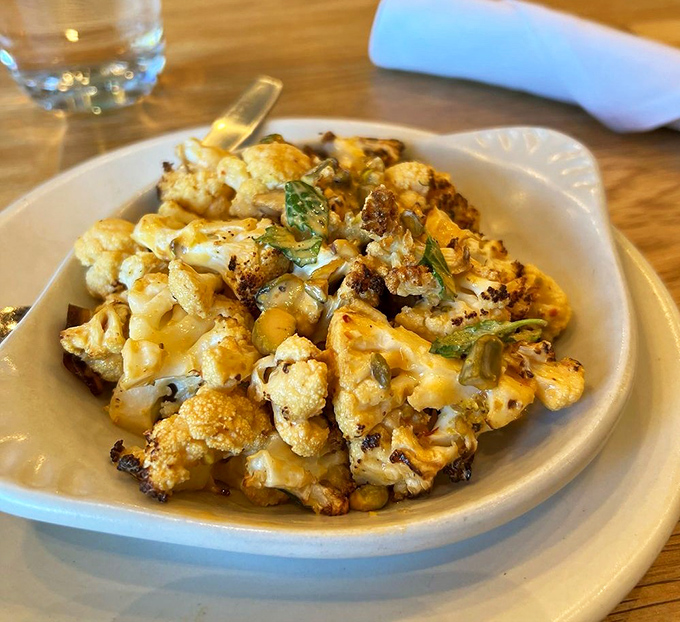 The star of the show: charred cauliflower that could convert even the most dedicated carnivore. Those caramelized edges are what vegetable dreams are made of.