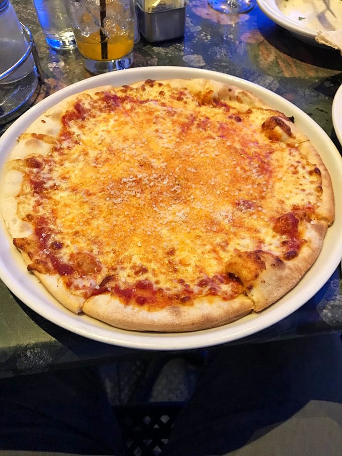 Behold the star of the show&mdash;a cheese pizza that achieves that mythical balance of crispy-yet-chewy crust, tangy sauce, and cheese melted to golden perfection.