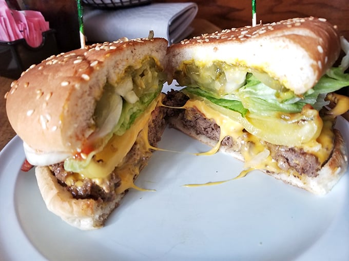 This isn't just a burger—it's a juicy manifesto of beef perfection, where melted cheese cascades like a yellow waterfall of happiness.