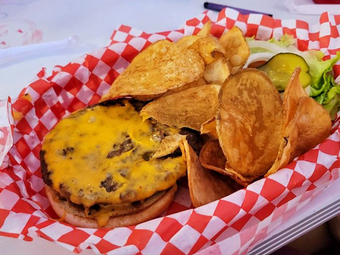 This isn't just a cheeseburger&mdash;it's a masterpiece of melted American cheese cascading over a hand-formed patty, with house-made chips that shatter like vinyl records.