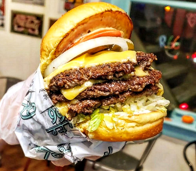 This isn't just a double cheeseburger&mdash;it's edible architecture, a towering testament to beef perfection wrapped in wax paper.