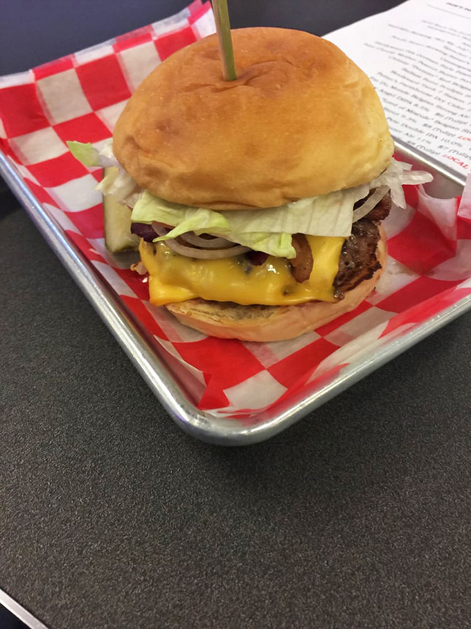 This isn't just a cheeseburger&mdash;it's edible architecture with layers of flavor that make your taste buds stand up and salute.