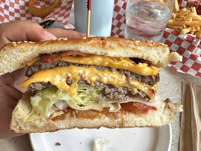 This isn't just a cheeseburger &ndash; it's edible architecture. Layers of beef, cheese, fresh veggies, and special sauce create the perfect bite every time.
