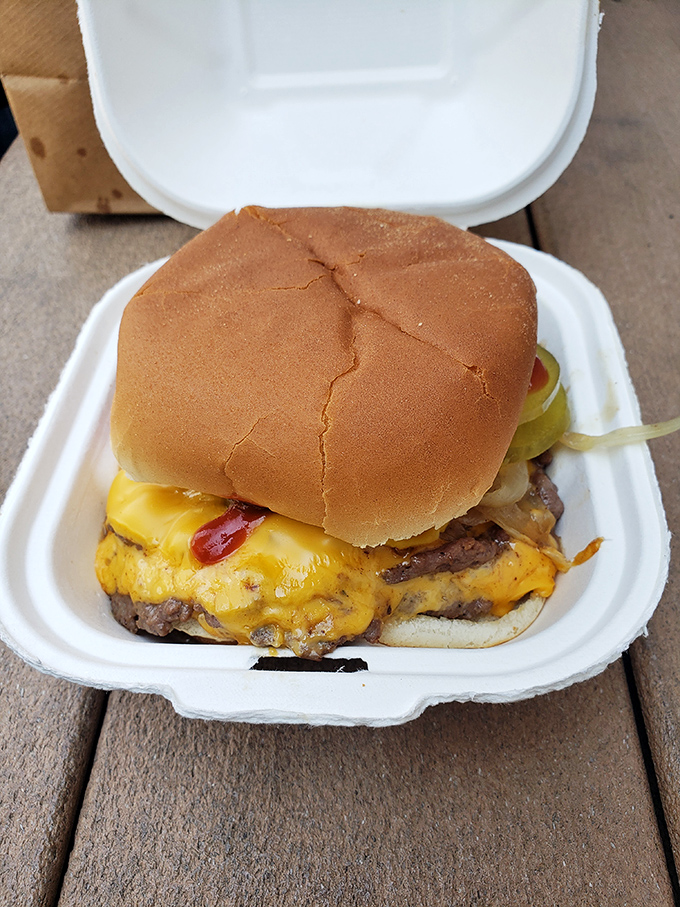 Cheese cascading over perfectly seared patties&mdash;this isn't just a cheeseburger, it's Wisconsin's love language translated into edible form.