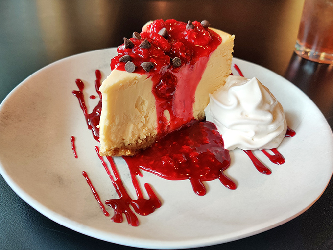 This berry-topped cheesecake isn't just dessert, it's an edible work of art that makes your fork pause mid-air for a moment of silent appreciation.