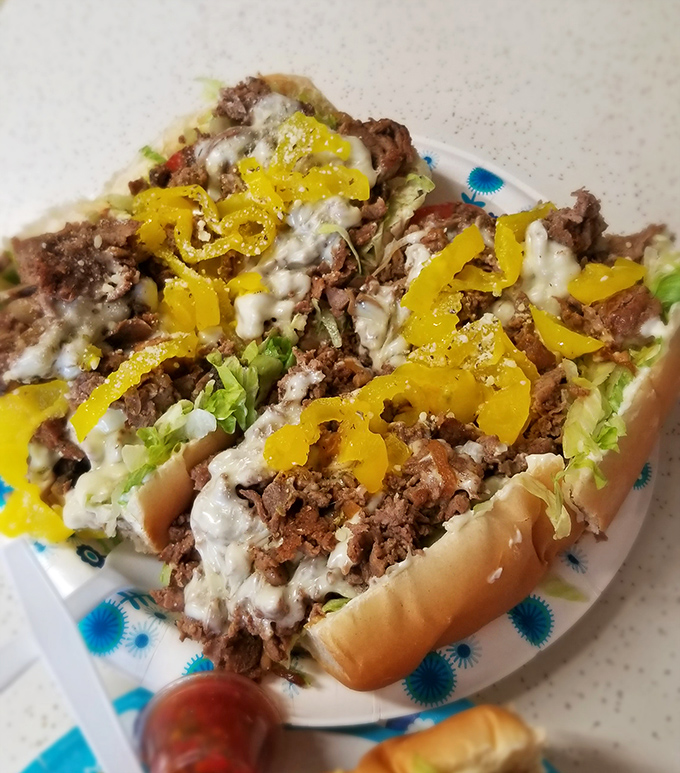 Behold the famous Pounder Cheesesteak in all its glory&mdash;where thinly sliced beef, melted cheese, and banana peppers create a holy trinity of flavor.