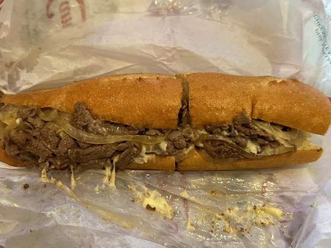Behold the holy trinity of Philly cheesesteak perfection: tender ribeye, melted cheese, and that roll&mdash;oh that roll! A sandwich that justifies crossing state lines.