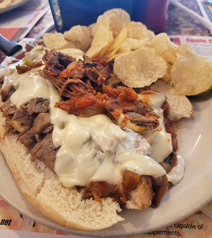 Behold the cheesesteak that launches a thousand road trips &ndash; perfectly melted cheese cascading over tender beef.