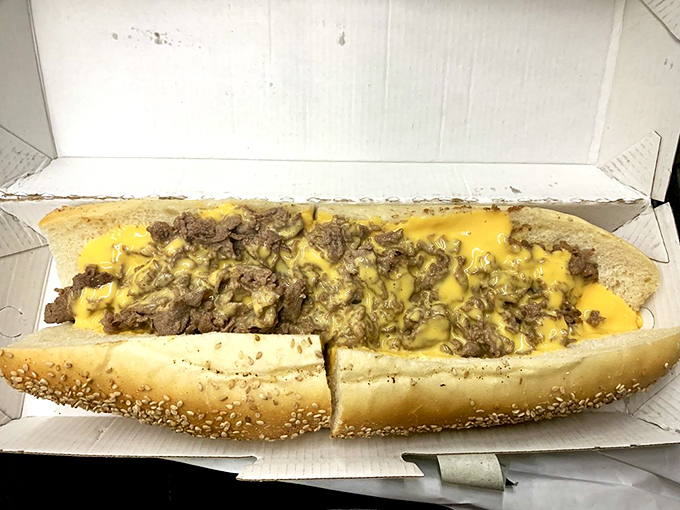 Behold the star of the show: ribbons of ribeye embraced by melted cheese, nestled in a perfect roll. Philadelphia's iconic sandwich done right.