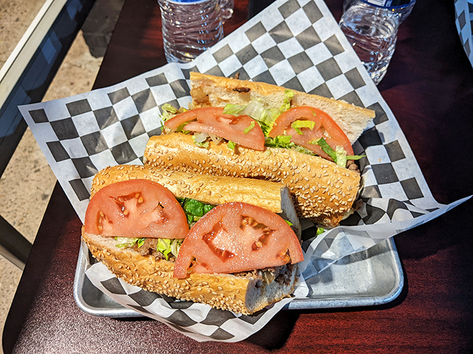This isn't just a sandwich; it's architecture. Layers of meat, cheese, and garden-fresh veggies create the skyscraper of hoagies.