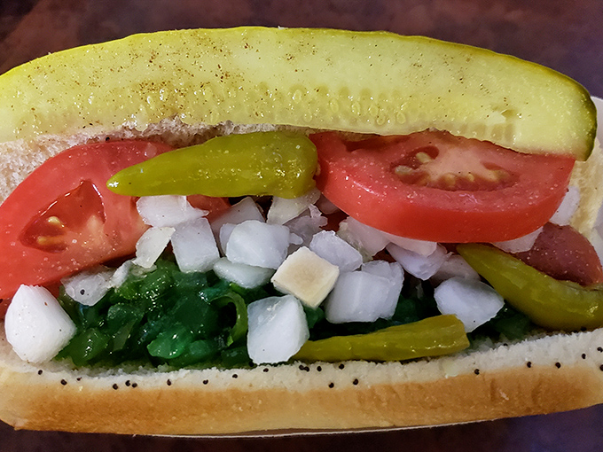 Behold the Chicago Dog in all its glory! That vibrant green relish and fresh vegetables create a symphony of flavors in every bite.