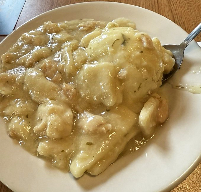 Behold the star attraction: chicken and dumplings that achieve that mythical balance between hearty and heavenly, with dumplings that practically float in savory broth.
