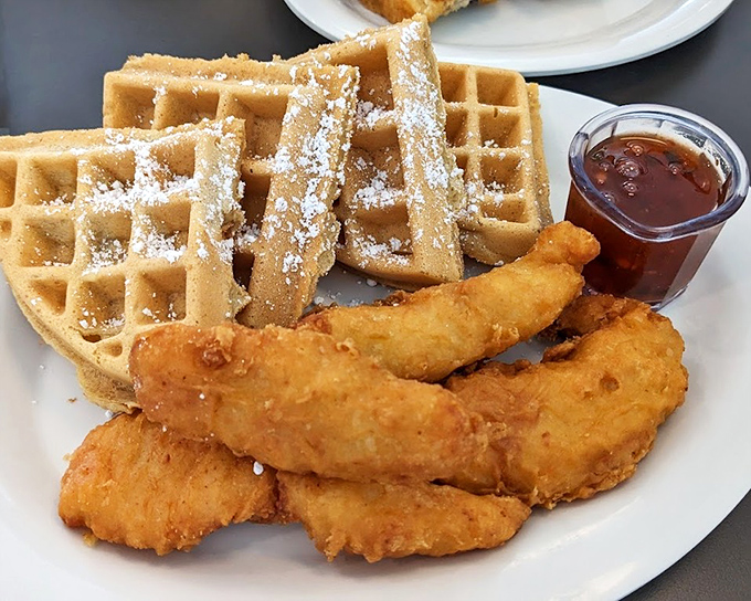 Golden-brown chicken meets powdered-sugar dusted waffles in breakfast's most beautiful love story. Like a morning hug on a plate, with maple syrup playing matchmaker.
