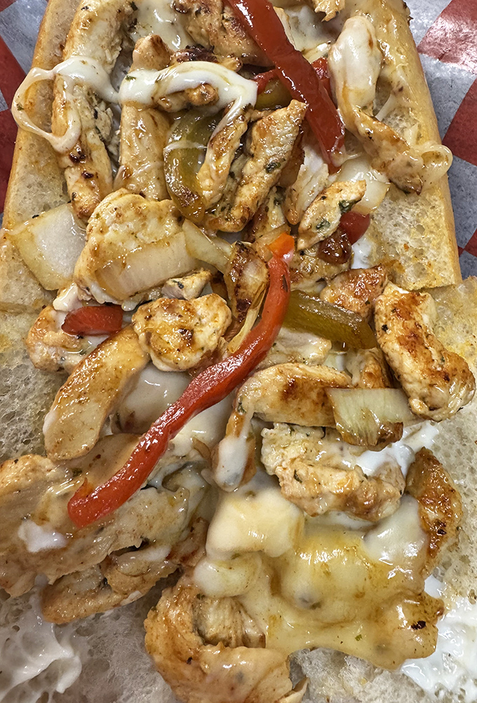 Behold the chicken cheesesteak in all its glory&mdash;tender morsels of seasoned chicken embracing melted cheese like long-lost lovers finally reunited.
