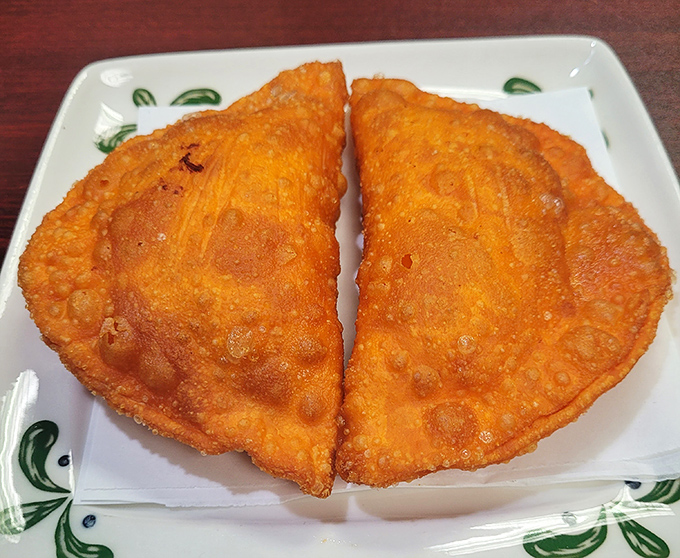 Golden-brown chicken empanadas with that perfect crispy-to-soft ratio&mdash;the kind of hand-held happiness that makes you wonder why you'd ever eat anything else.