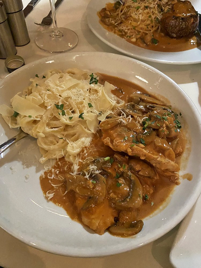 This chicken marsala isn't just dinner; it's therapy in mushroom sauce form, with pasta playing the supportive friend role perfectly.