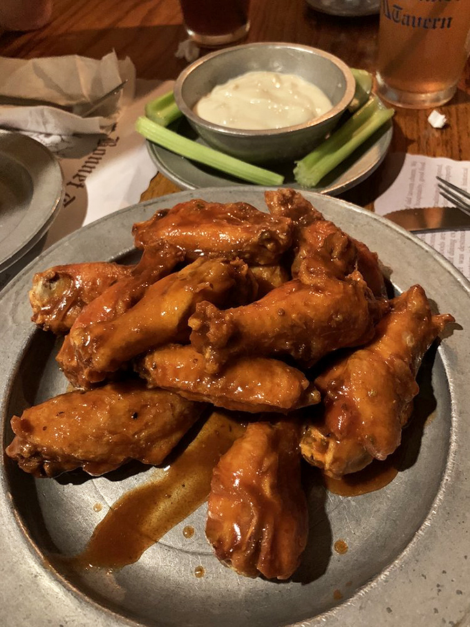 These wings aren't just good—they're "text your friends immediately" good, glistening with sauce that demands both napkins and respect.