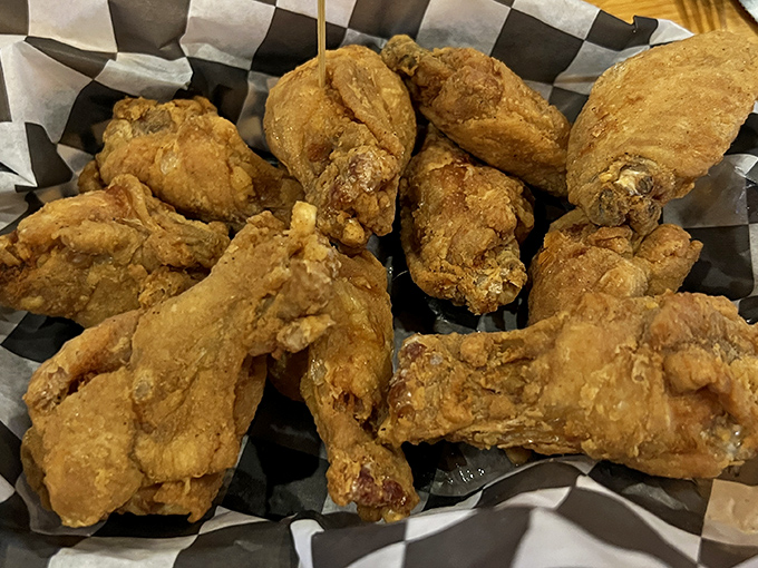 Golden-fried perfection in a basket &ndash; these wings aren't just food, they're an experience worth crossing county lines for.