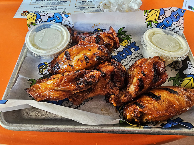 These wings aren't just cooked&mdash;they're transformed through some mystical process that turns ordinary chicken into a religious experience worth traveling for.