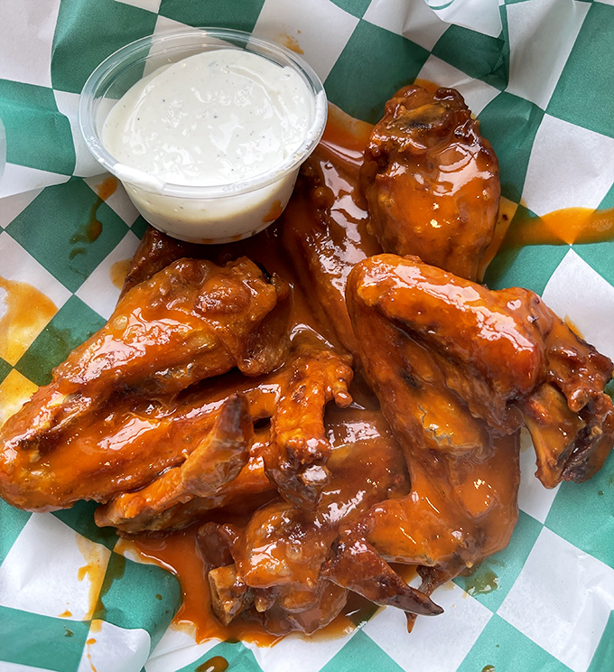 These buffalo wings aren't just cooked&mdash;they're transformed. That lard confit technique creates a spiritual experience with every saucy bite.