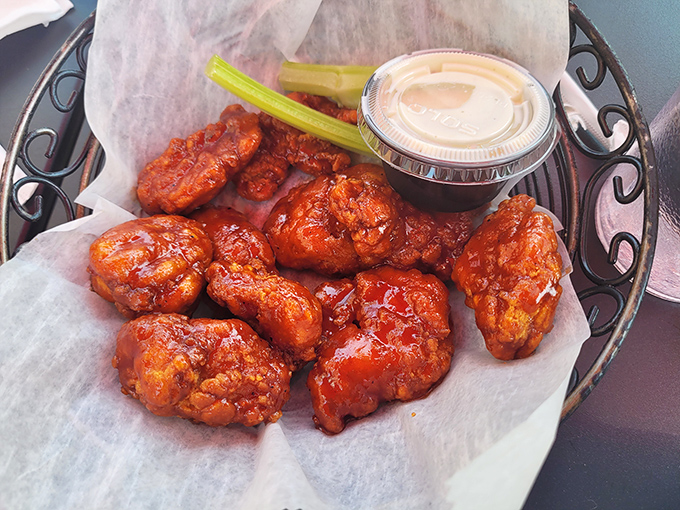 These wings aren't just good, they're life-changing &ndash; glistening with sauce that clings to each morsel like it's afraid of missing the party in your mouth.