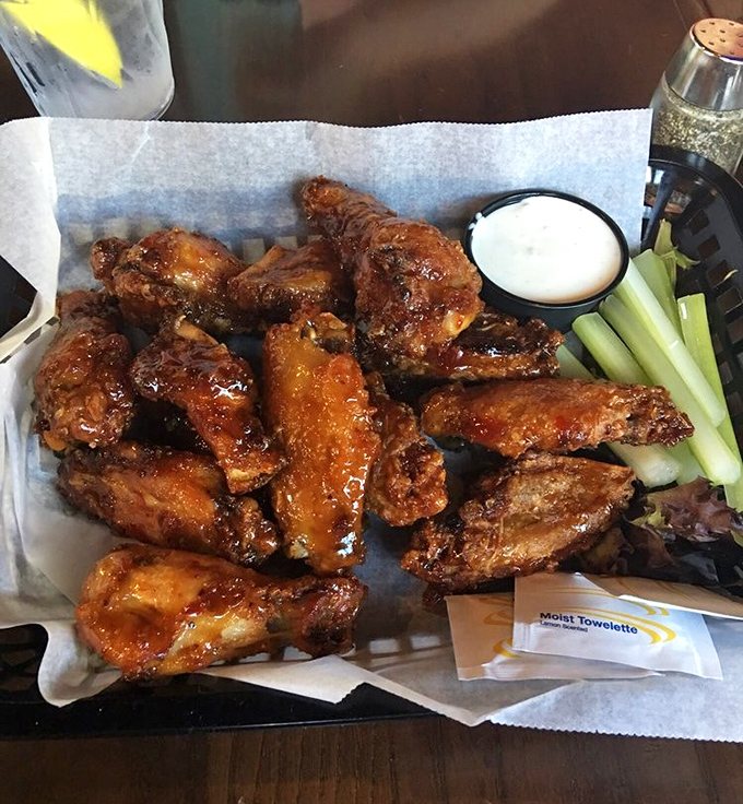 Wings that demand respect and extra napkins—gloriously sauced, perfectly crispy, and meaty enough to make vegetarians question their life choices.