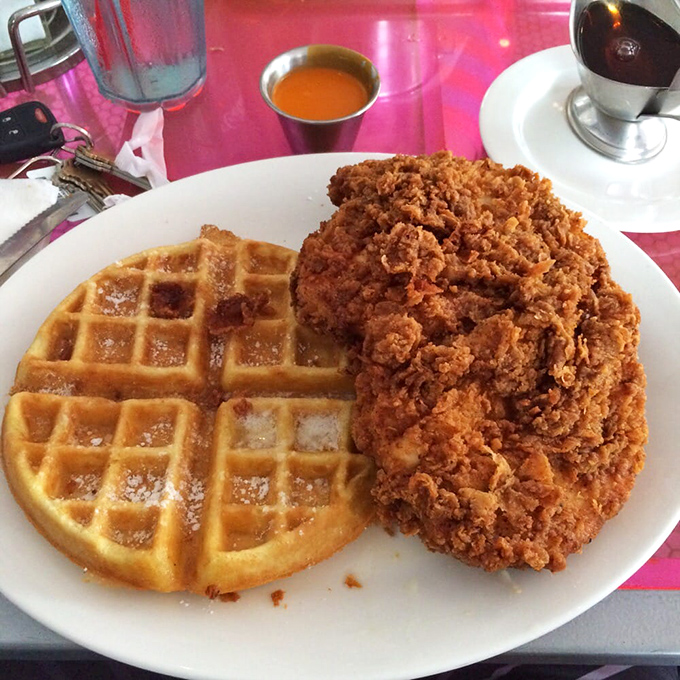 The legendary chicken and waffles&mdash;where sweet meets savory in a romance more compelling than any beach read. Worth every calorie and food coma.