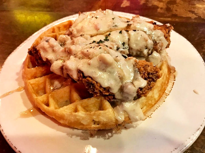 Chicken and waffles: where crispy meets fluffy in perfect harmony. This plate hits higher notes than Elvis in his prime.