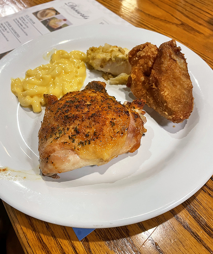 Golden-crusted chicken that shatters at first bite, paired with mac and cheese that would make your childhood self weep with joy.