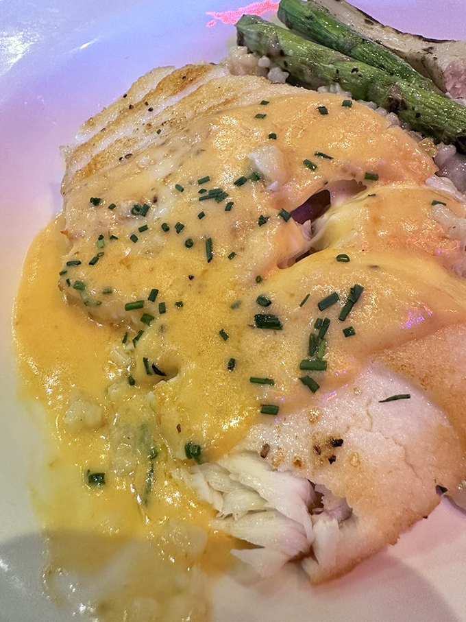 Chilean Sea Bass that's dressed better than most people at a wedding&mdash;pistachio risotto and that glistening sauce deserve their own Instagram account.