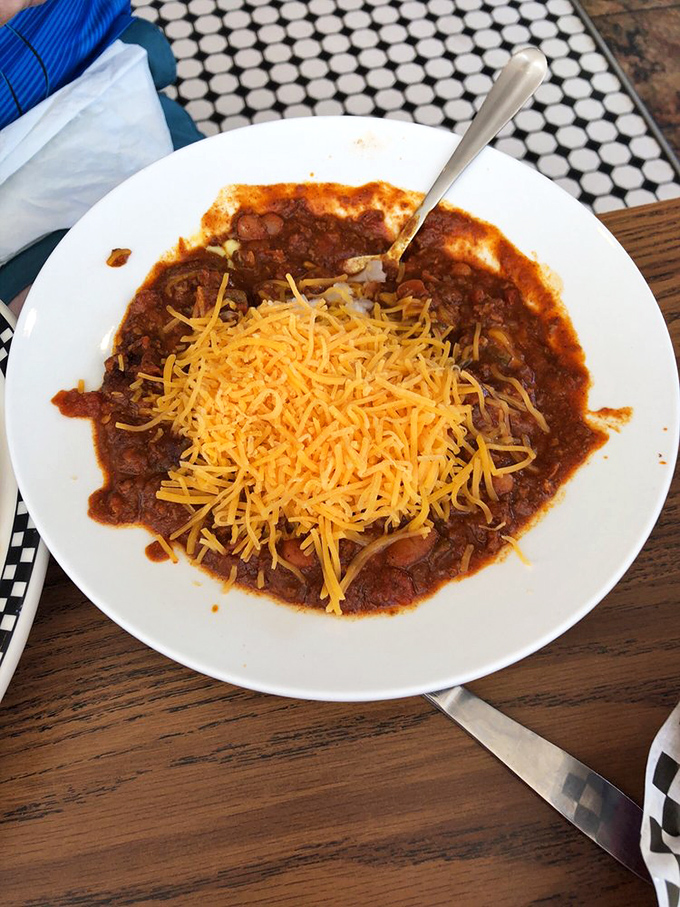 This isn't just chili &ndash; it's a spicy time machine topped with enough cheese to make Wisconsin nervous.