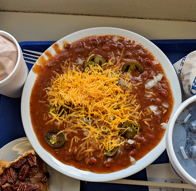 The legendary chili cheese in all its glory! That perfect ratio of savory meat sauce to melted cheese creates a symphony that makes taste buds stand and applaud. 