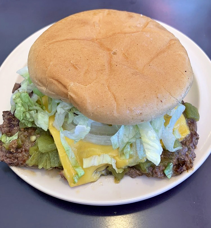 Behold the legendary green chile cheeseburger in all its glory&mdash;where beef, cheese, and chile create a holy trinity of flavor.
