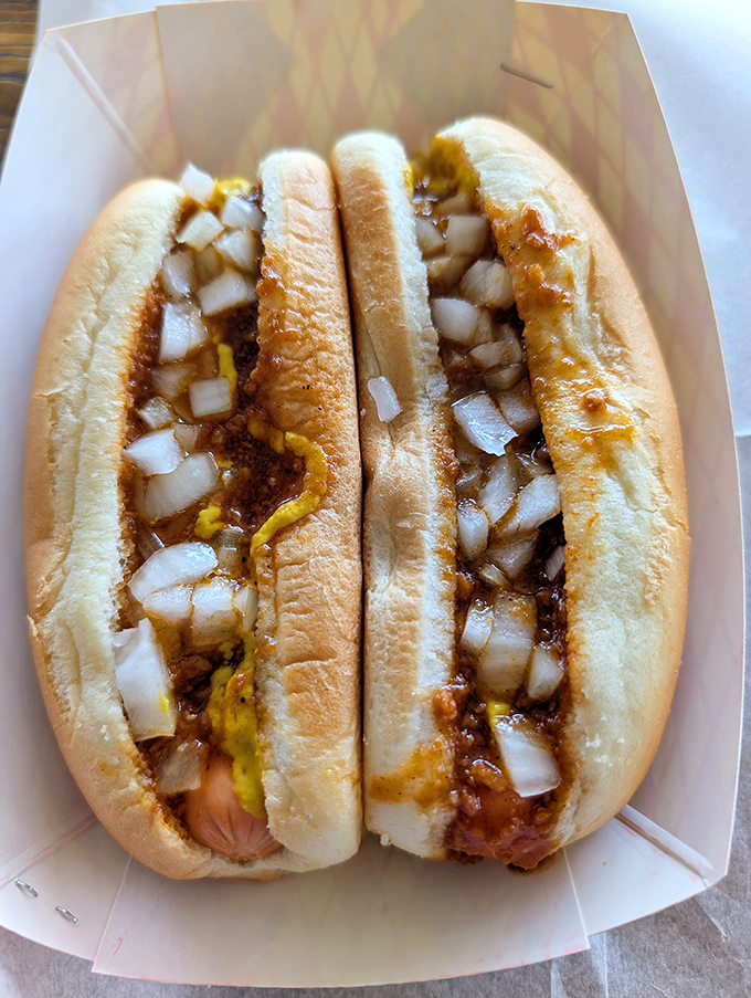 The hot dog of your dreams: perfectly nestled in its bun with that symphony of toppings that makes every bite a beautiful mess.