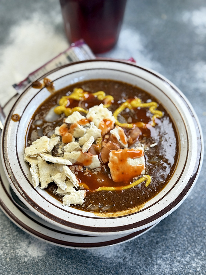 Behold the legendary chili—thick enough to stand a spoon in, yet somehow still elegant. Comfort in a bowl.