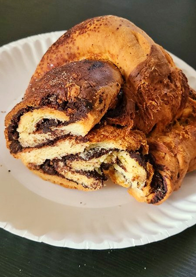 Behold the star attraction: chocolate babka with swirls so hypnotic they should come with a warning. Resistance is futile!