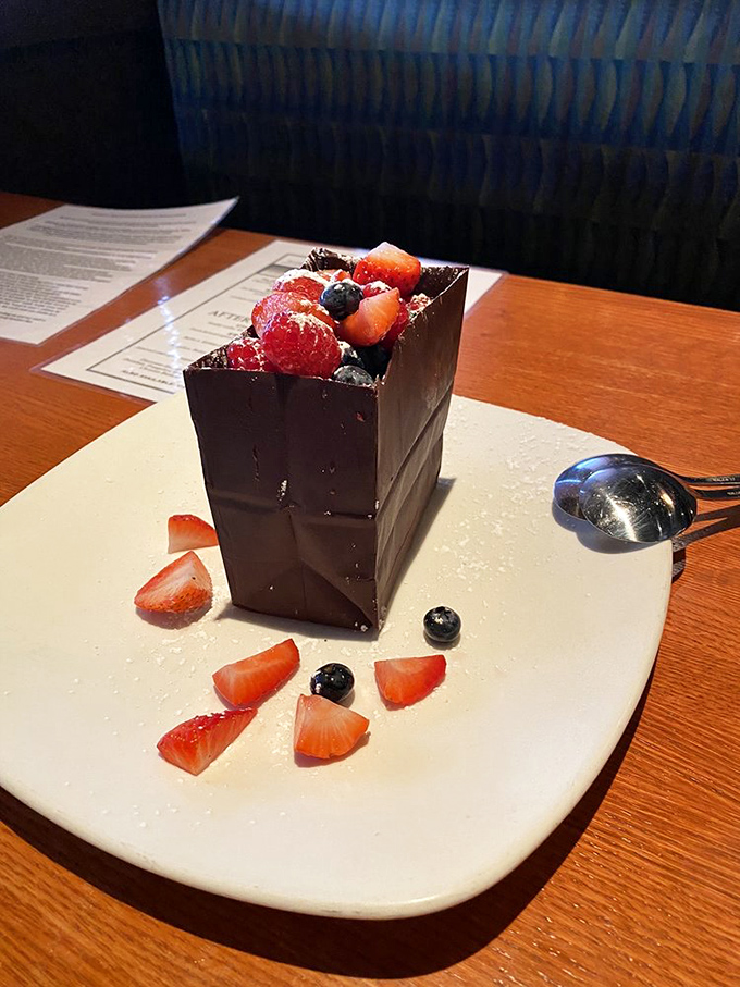 Behold the legendary chocolate bag&mdash;an architectural marvel of sweetness. Fresh berries peek out like treasures from a delicious chocolate pirate chest.