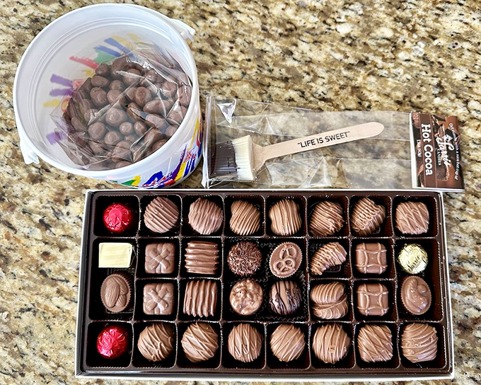 Chocolate soldiers standing at attention in their perfect rows. The "Life is Sweet" paddle isn't just cute &ndash; it's stating the obvious here.