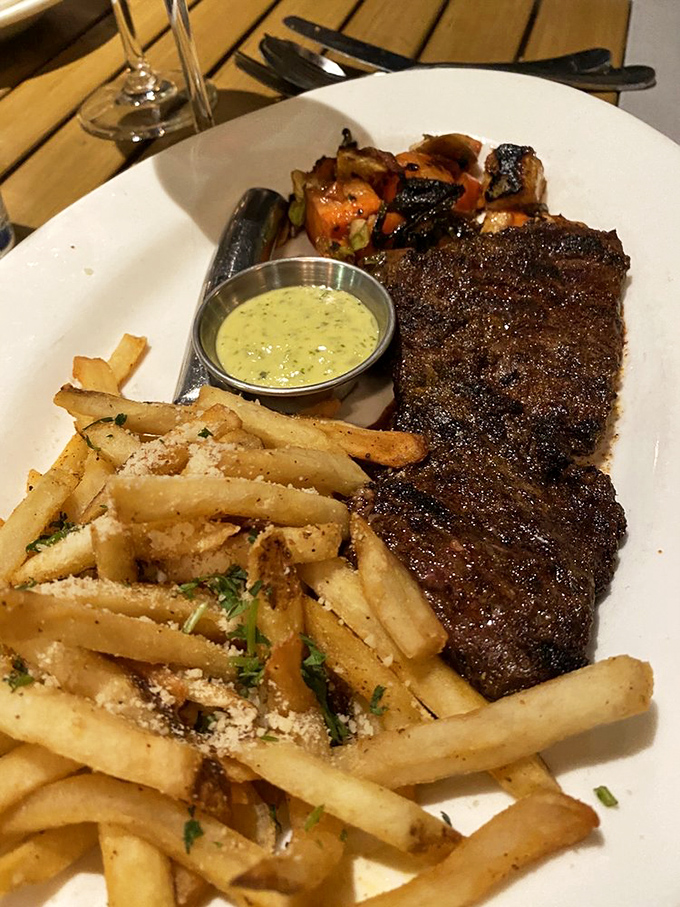 The churrasco steak arrives with perfect grill marks that say, "Yes, this is the dish locals drive across town for." That herb sauce could make cardboard taste gourmet.
