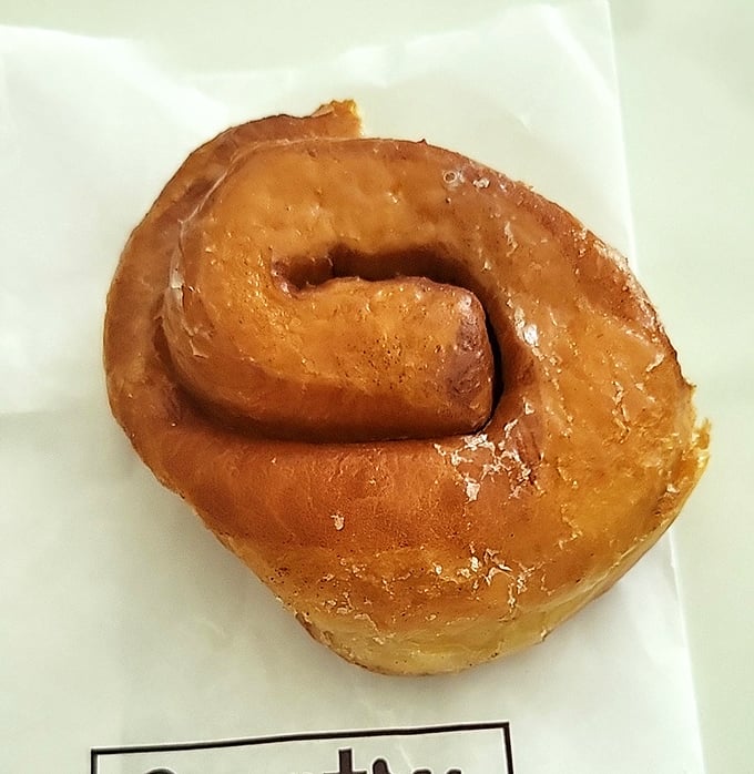 The humble cinnamon roll—architecture in pastry form. That spiral isn't just design; it's a roadmap to happiness that gets better with every turn.