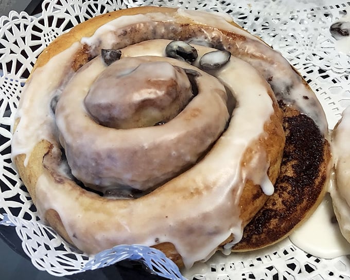 This cinnamon roll isn't just baked&mdash;it's engineered for maximum pleasure. Pillowy dough, melted raisins, and icing that doesn't know when to quit.